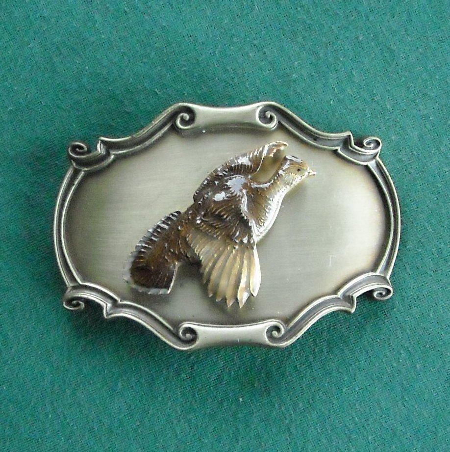 Vintage Raintree bird 3D belt buckle 1978