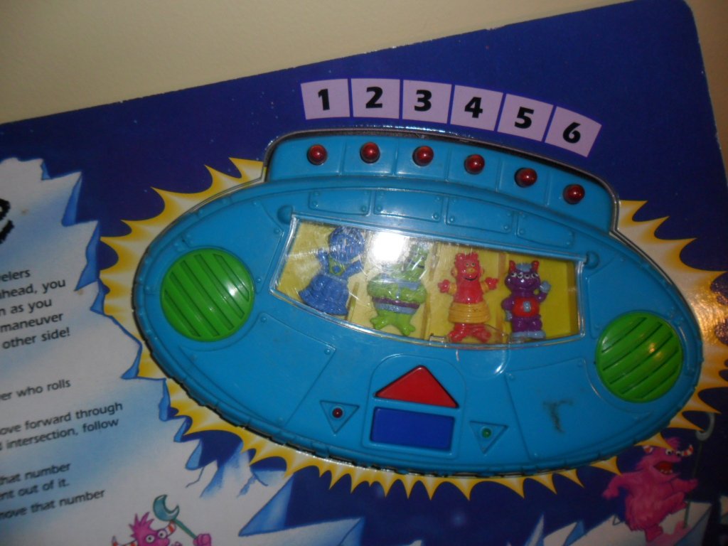 1997 Giant Intergalactic Electronic Game Book 6 Action Packed Games (SOLD)