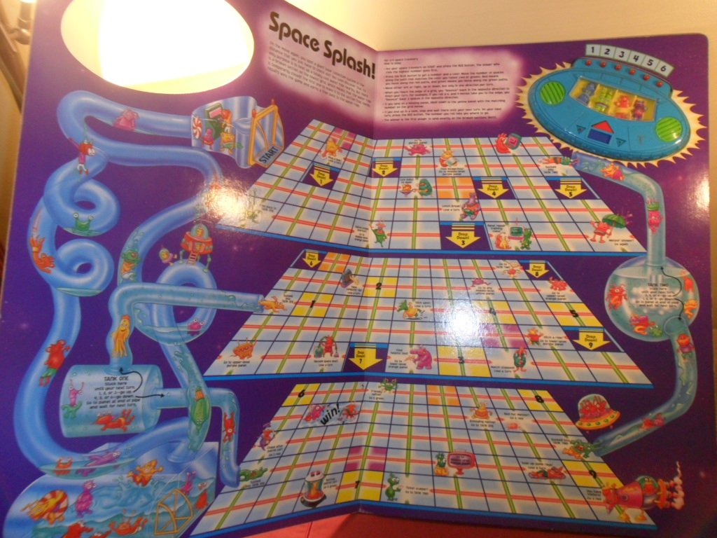 1997 Giant Intergalactic Electronic Game Book 6 Action Packed Games (SOLD)