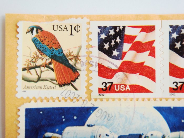 Partial Envelope with eleven United States Postage Stamps and Ink ...