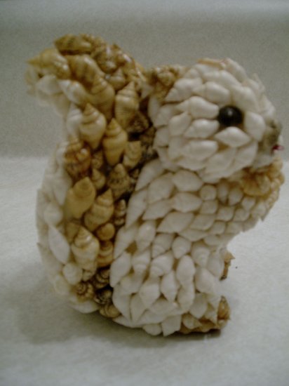 Amazing squirrel figurines entirely made from sea shells
