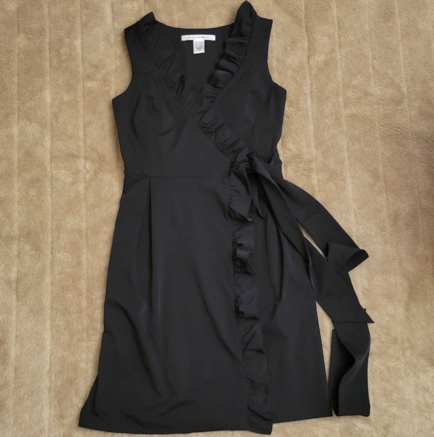 Diane Von Furstenberg classic wrap dress with ruffle trim and easy material