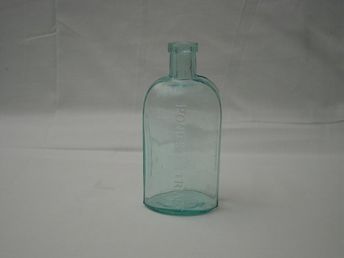 Light Blue Glass Pond's Extract Bottle