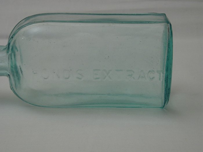 Light Blue Glass Pond's Extract Bottle