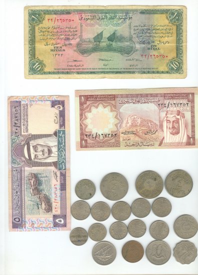 old saudi money paper and coinand kuwait bahrain iraq libya coin