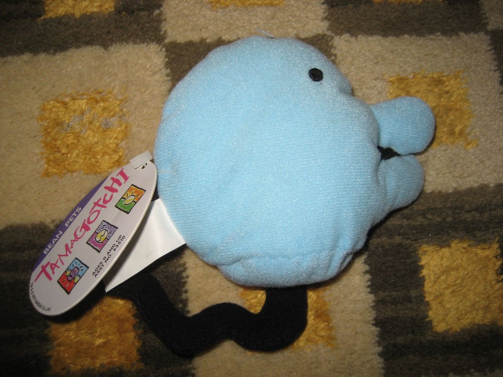 ONE NEW WITH TAG RARE BANDAI 1997 ORIGINAL TAMAGOTCHI BEAN PETS NYOROTCHI