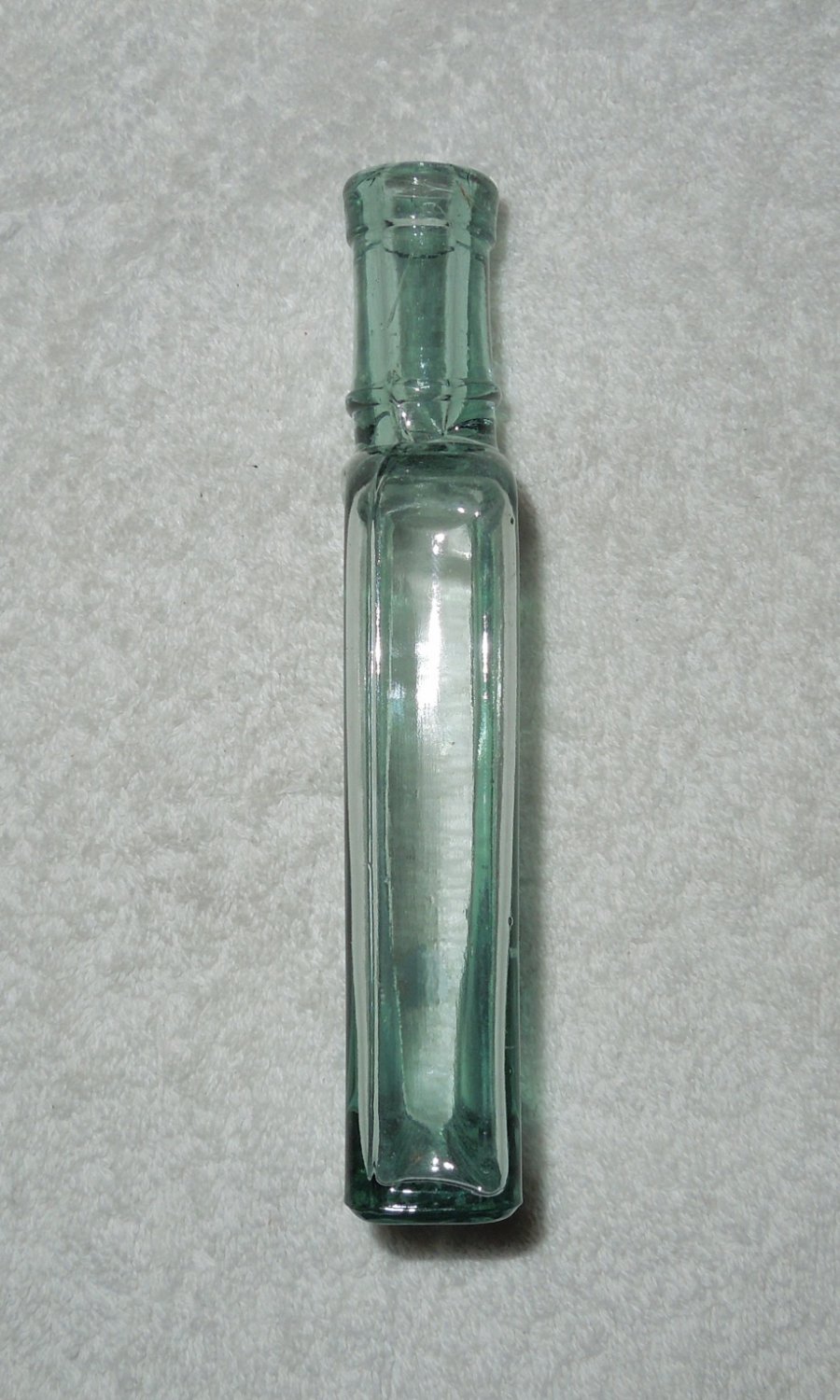 Clear Blue Glass Rectangular Paneled Bottle w/ Manufacturing Bubbles ...