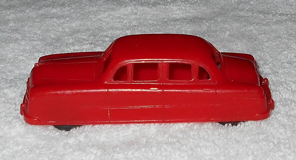 BHS - 1-183 - Red Four Door Car - Plastic - Made In USA - Vintage
