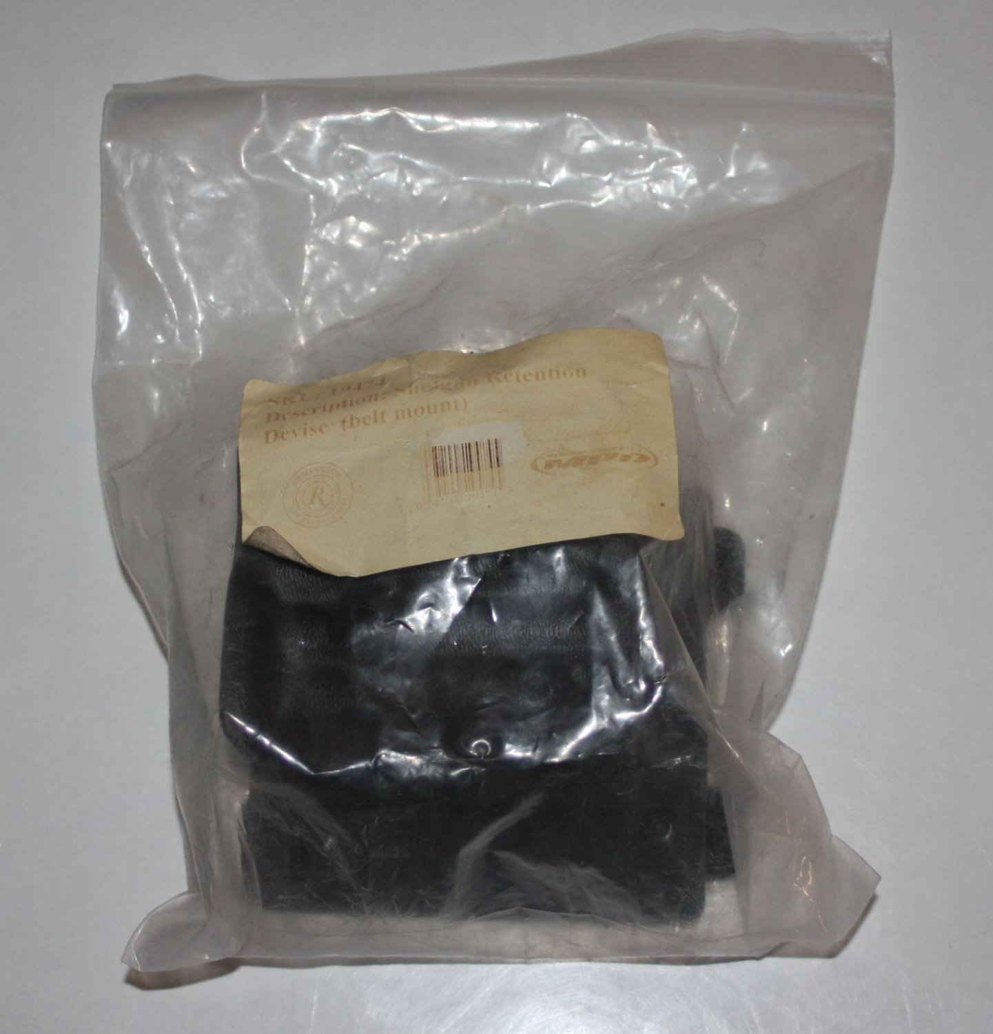 Remington belt mount shotgun retention device