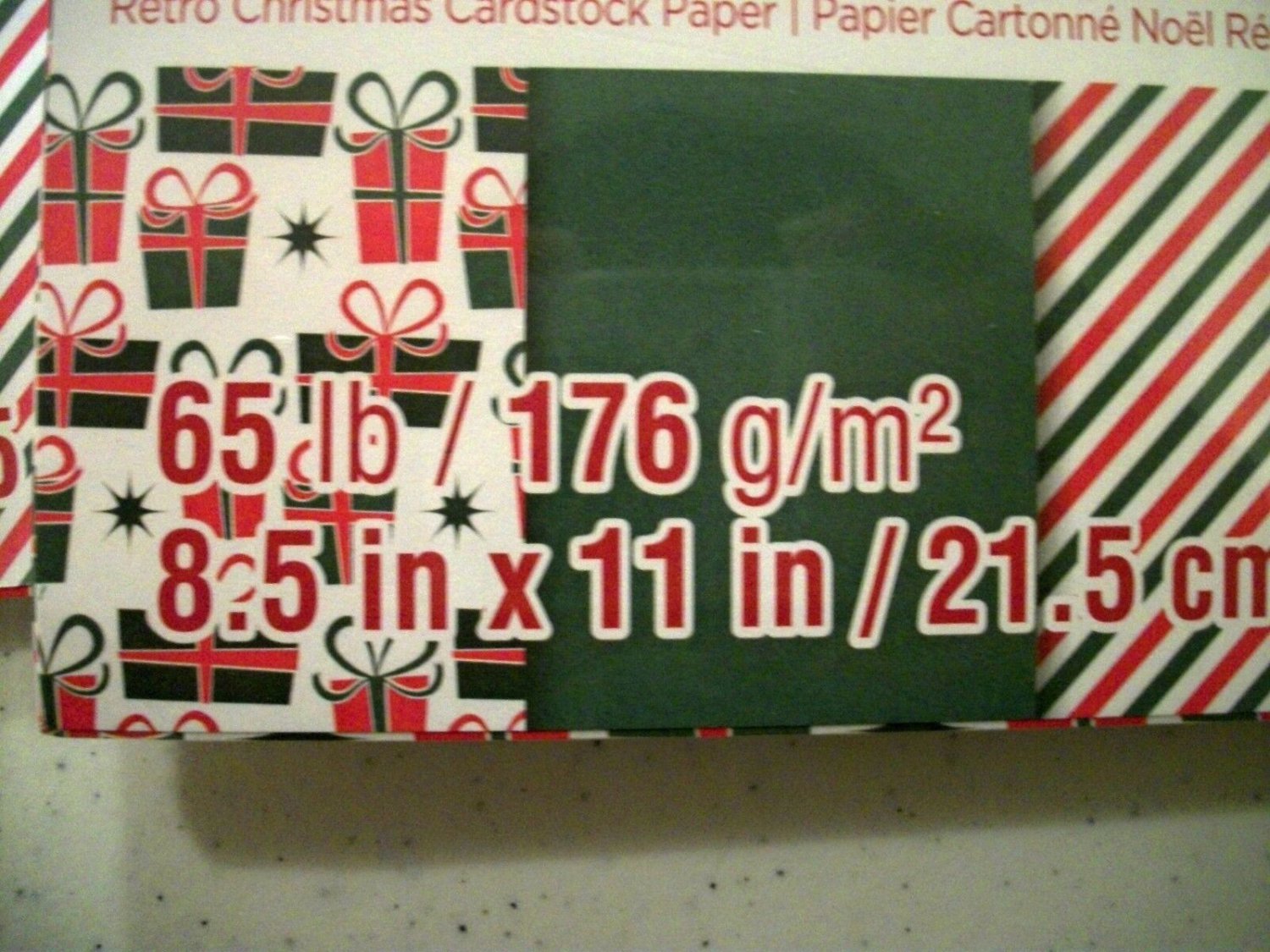 Two Packages Of Christmas Holiday Cardstock For Craft Projects