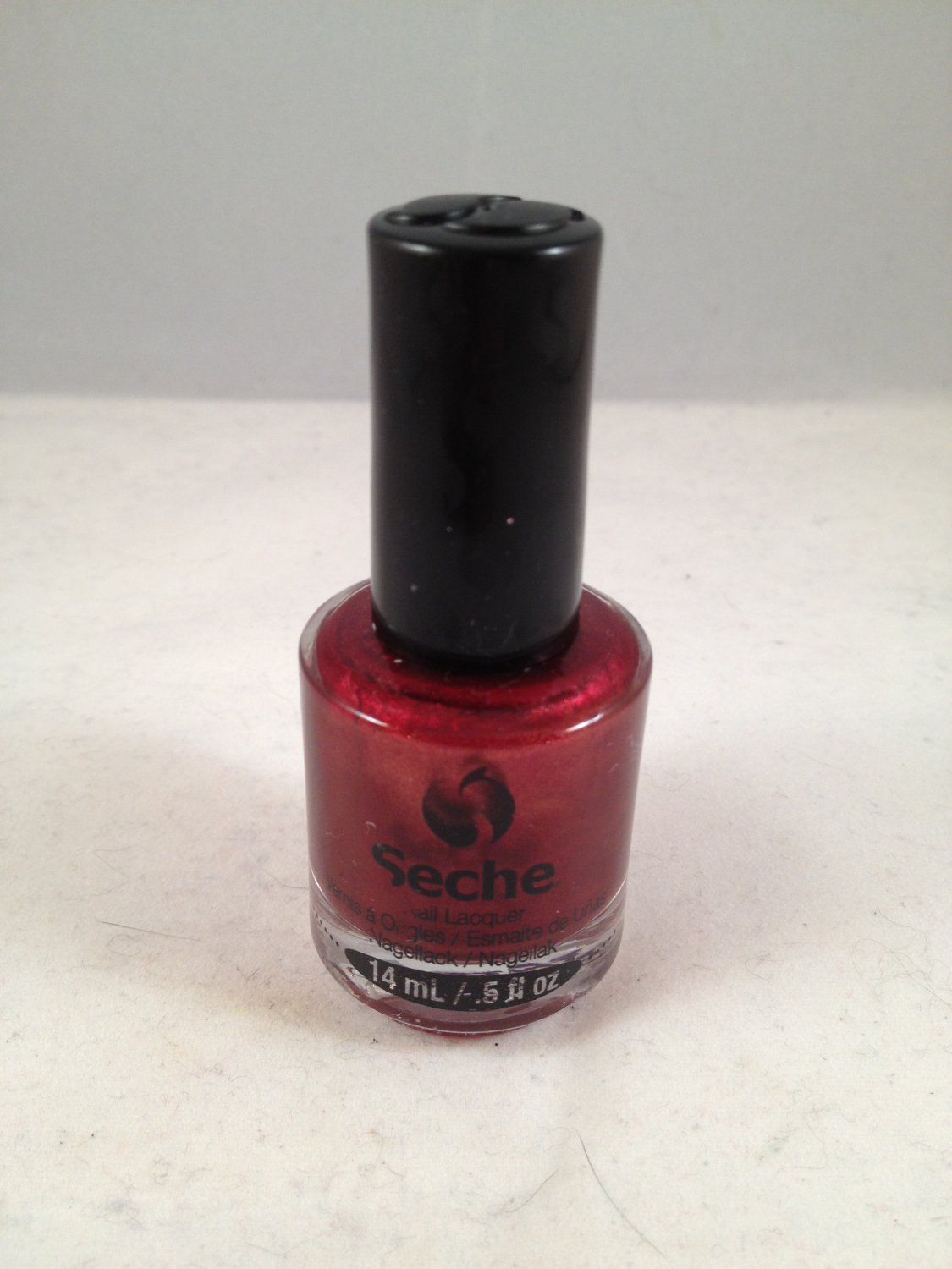 Seche Nail Lacquer Iconic color polish ruby red with gold shimmer