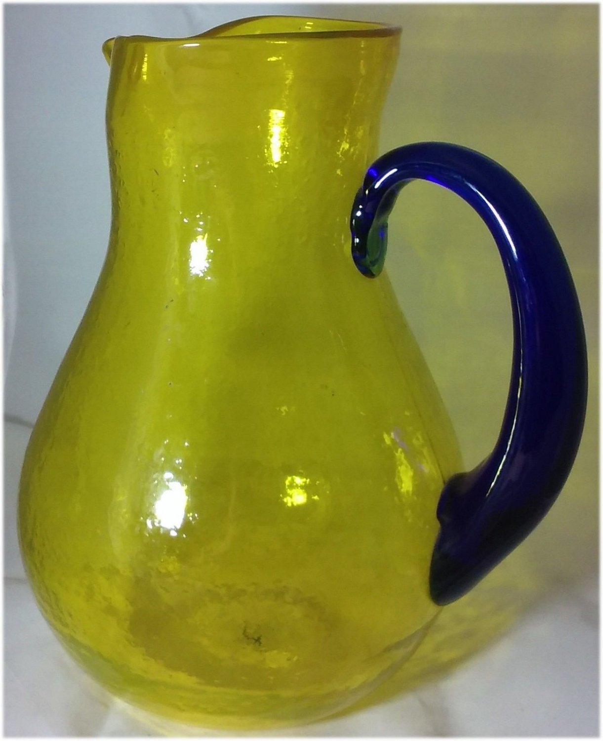 Artland Yellow and Blue Handle Glass Pitcher Large