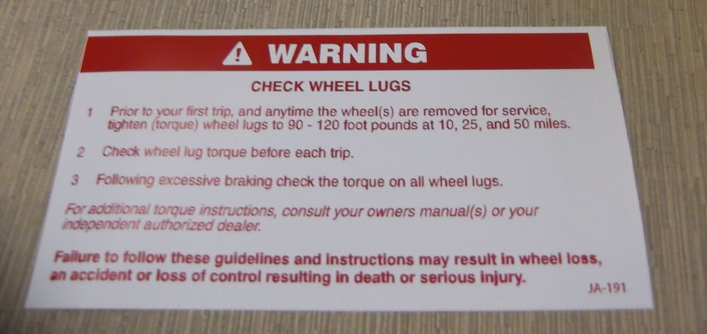RV Safety Decal "Warning: Check Wheel Lugs" #0182179 UPC:710534473675