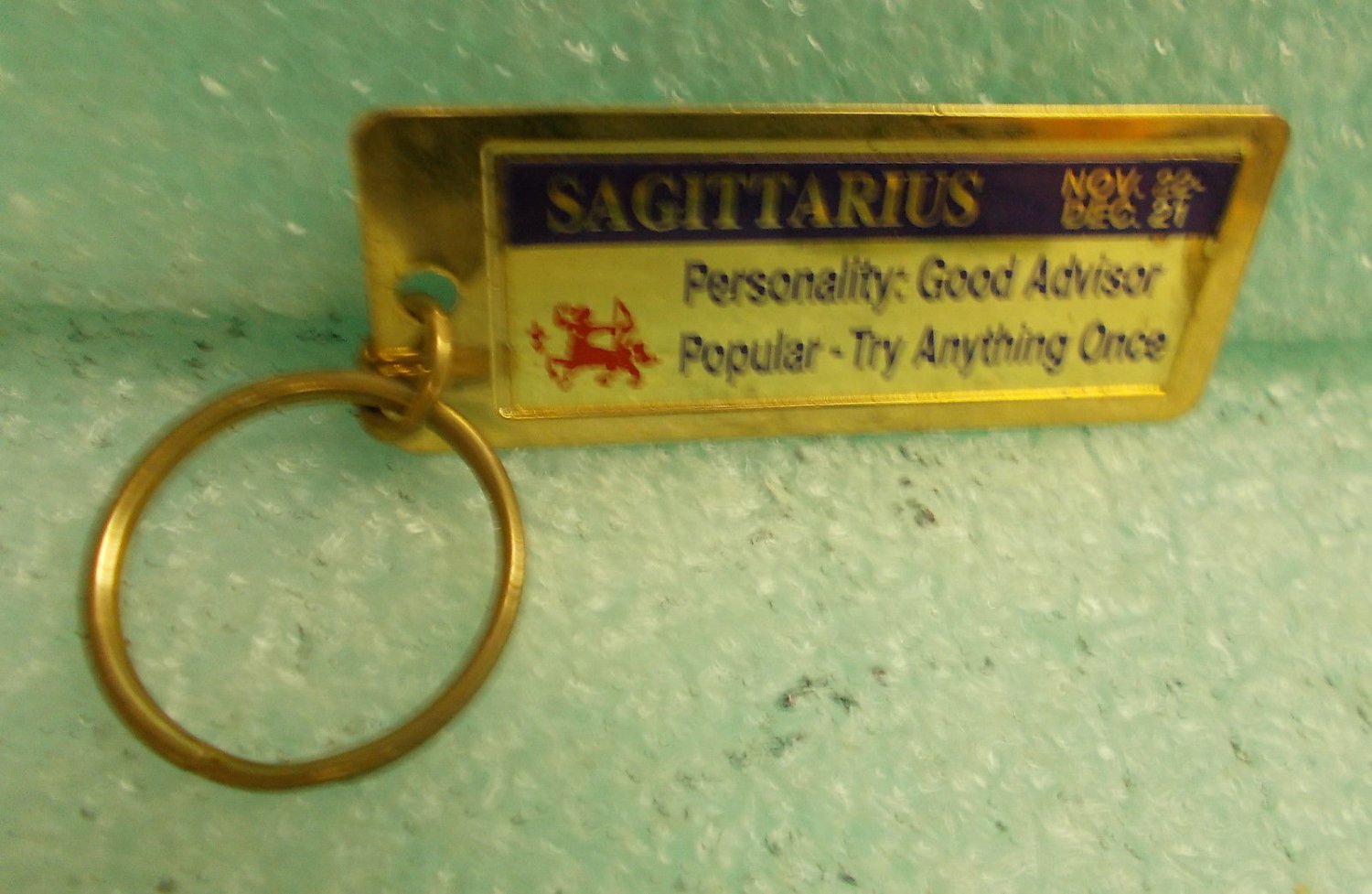 St. Evans Purple "Sagittarius" Metal Key Chain 1 1/4" X 3" UPC:710534489928