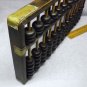Abacus, pretty old, and original handmade, made of wood and brass.