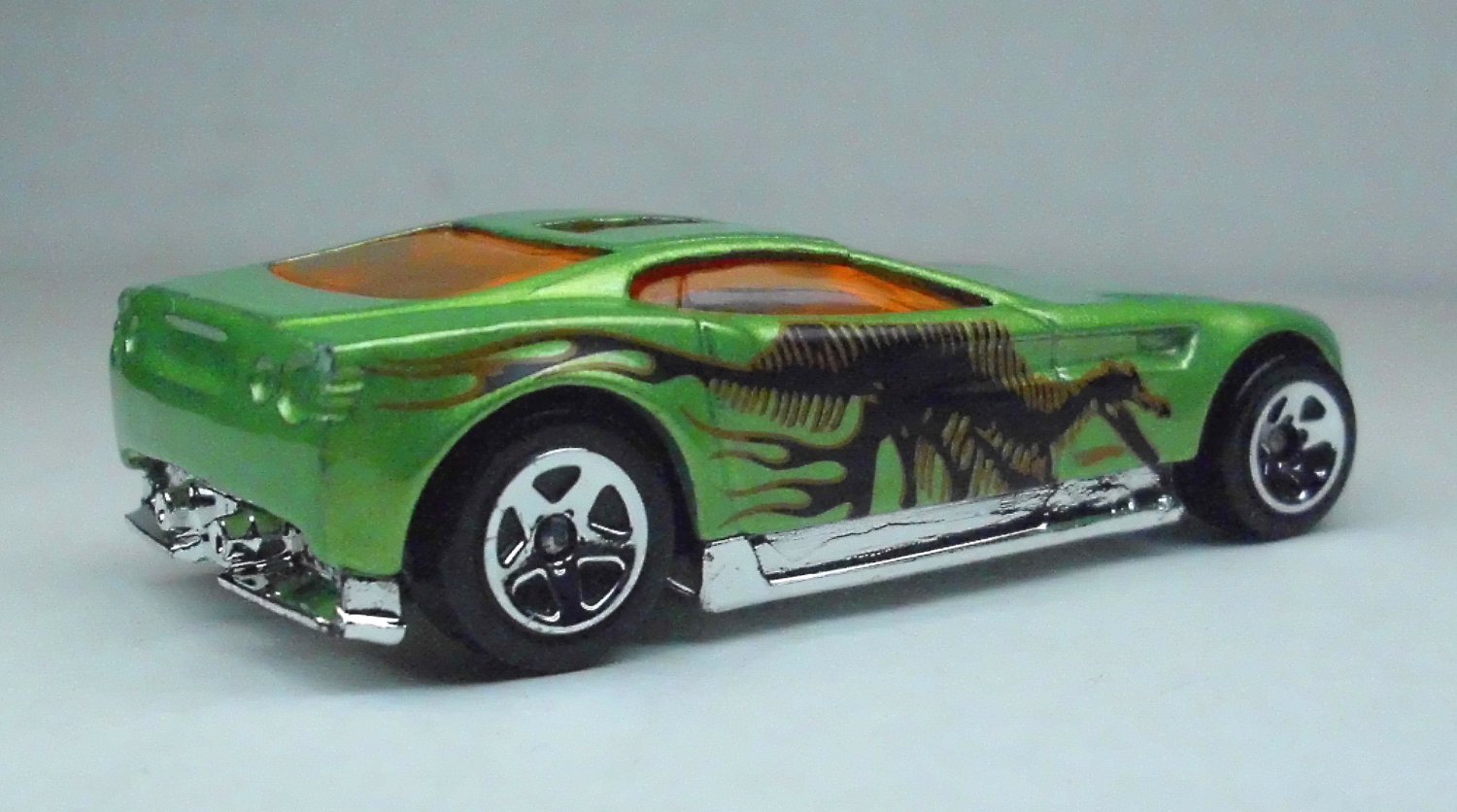 Torque Screw, Hot Wheels metallic lime green die cast car with Dinosaur ...