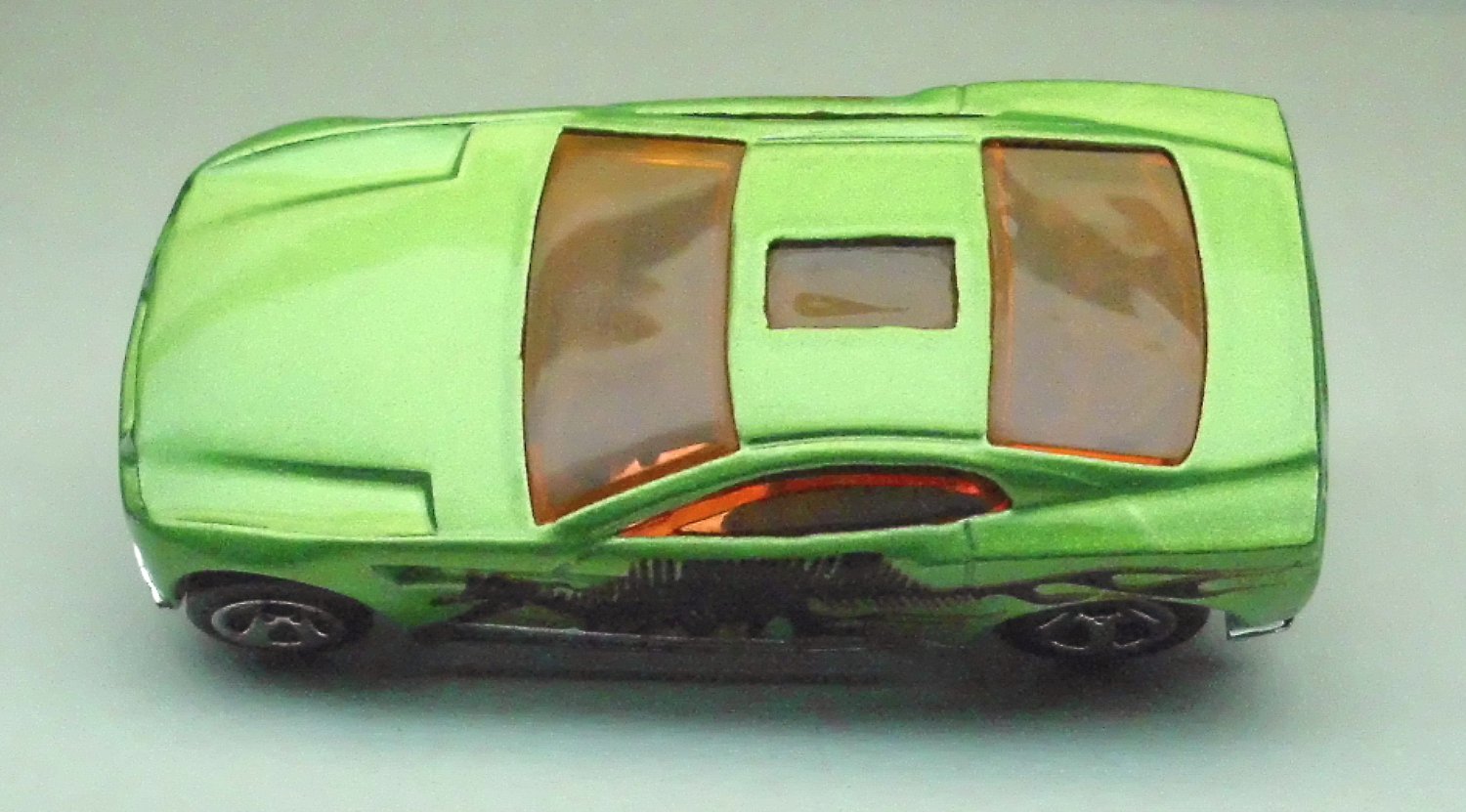 Torque Screw, Hot Wheels metallic lime green die cast car with Dinosaur ...
