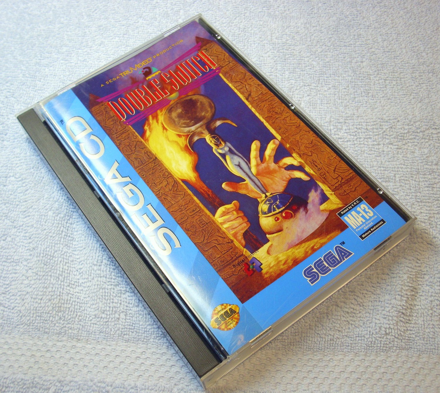 Double Switch Sega CD Genesis, with Game manual and case Sold AS-IS, 1993.