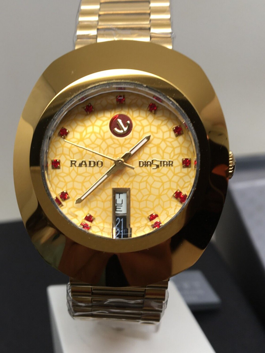 Authentic Rado Diastar R12413287 Automatic Gold Tone Red Stone Dial Watch