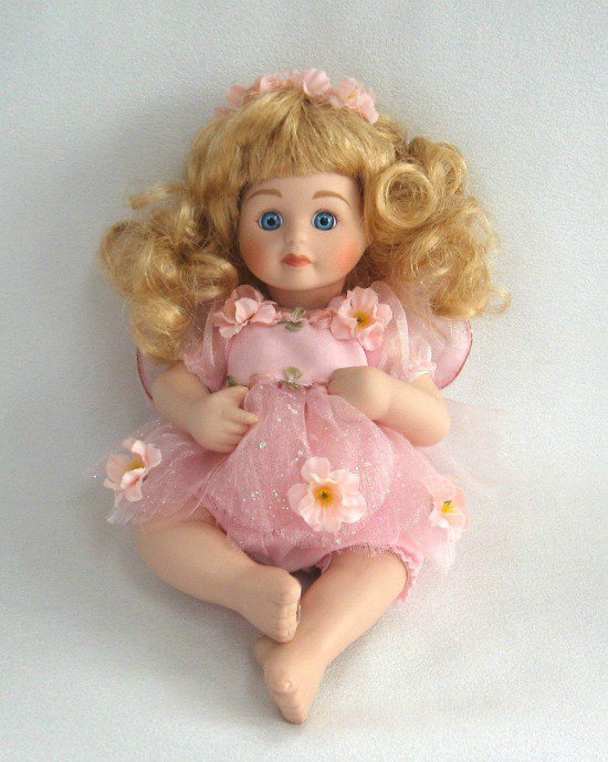 Porcelain Baby Girl Doll Curly Blonde Hair Pink Outfit Blue Eyes Delton ...