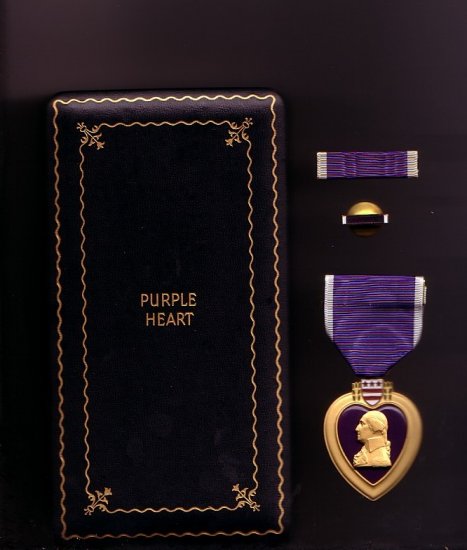 Purple Heart medal in WWII case with ribbon bar and lapel pin