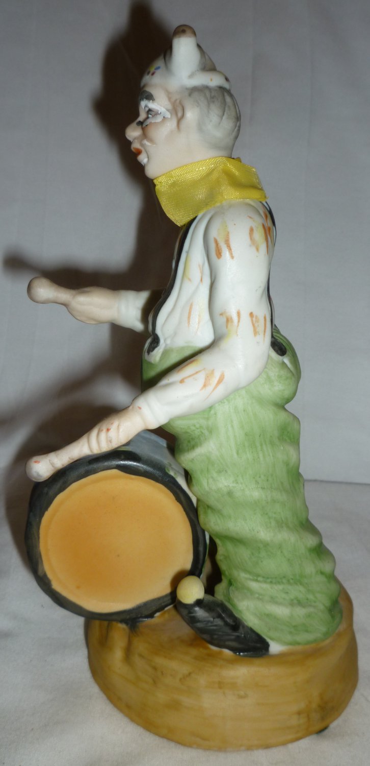 CHARMING PORCELAIN BISQUE HANDPAINTED CLOWN PLAYING DRUM FIGURINE
