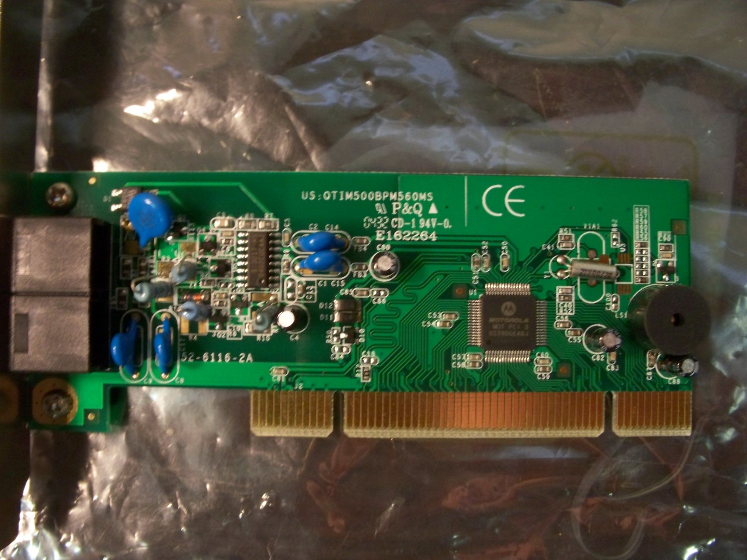 P&Q PM560MS-U 56kbps Telephone Modem PCI Adapter (QYIM500BPM560MS) *USED*