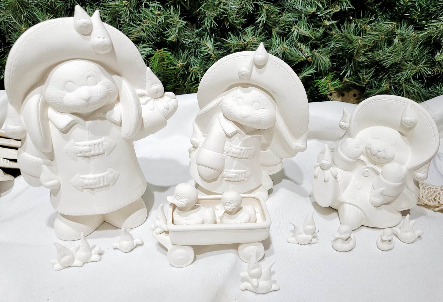 Dona puddle bunnies wearing raincoats