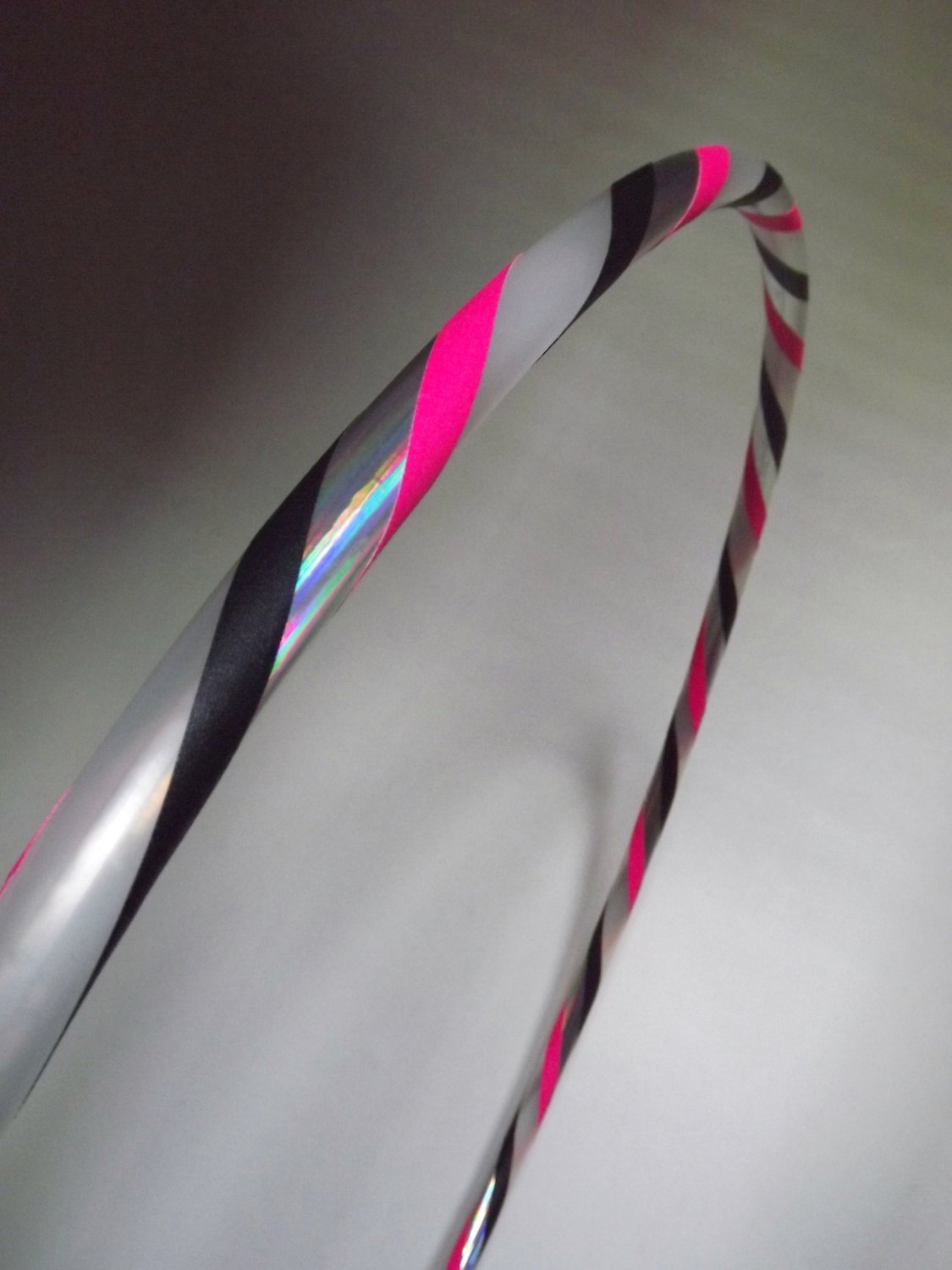 UV Pink and Black Half taped - PolyPro hula hoop