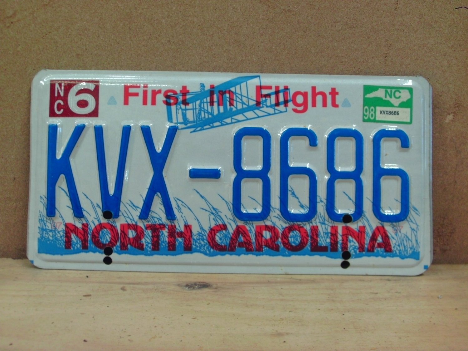 1998 North Carolina NC Error License Plate KVX-8686 Mispunched Holes NCO1