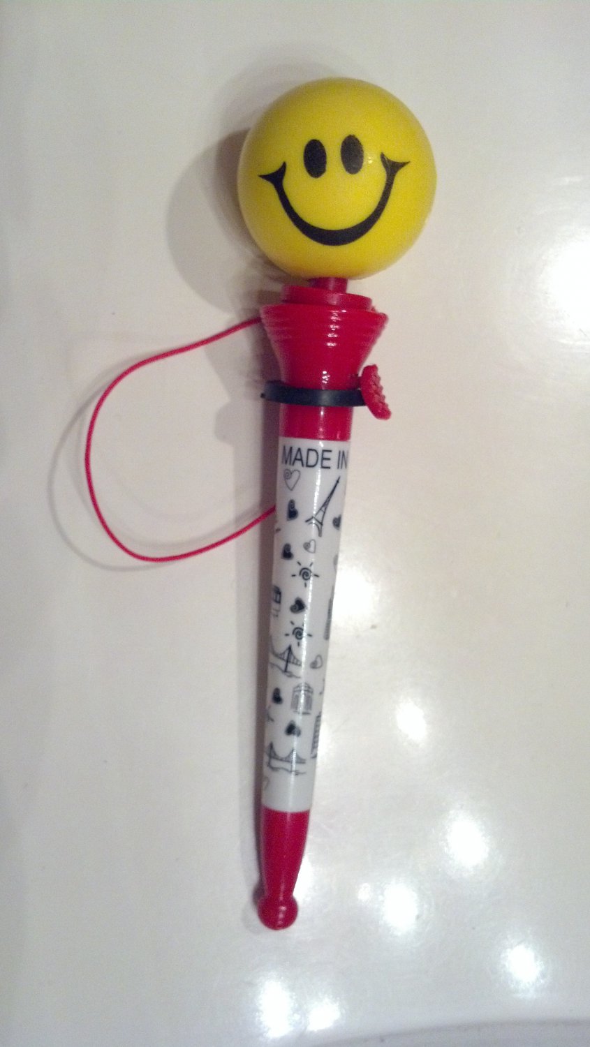 Smiley Face Jump Pen, yellow face with red housing