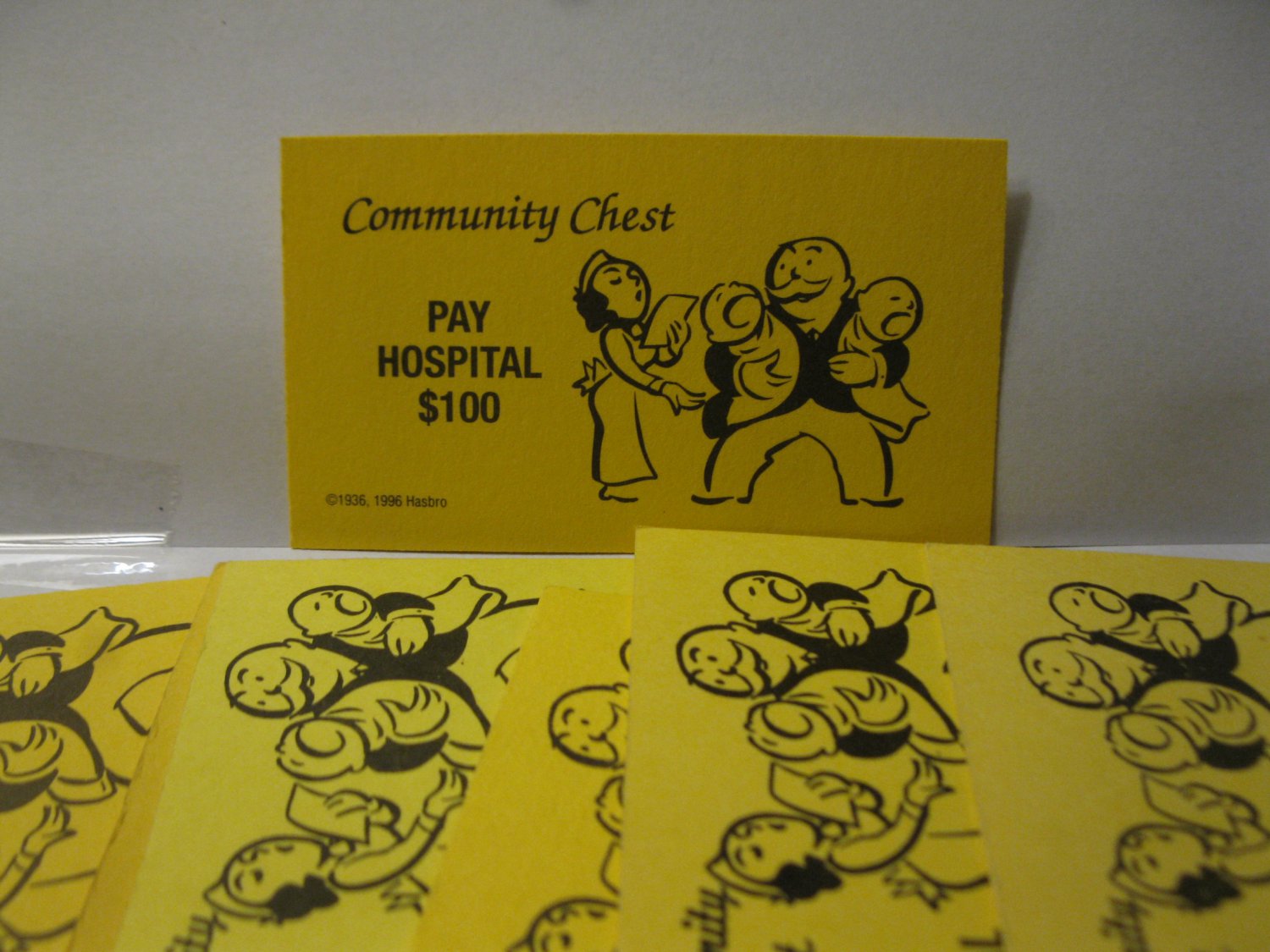 Board Game Piece: Monopoly - random Pay Hospital $100 Comm. Chest Card