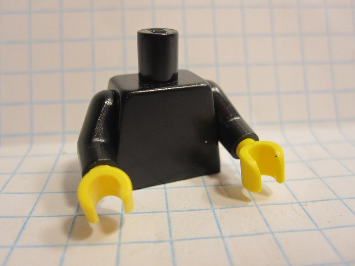 Lego part #973c018: Plain Black Torso w/ Yellow Hands