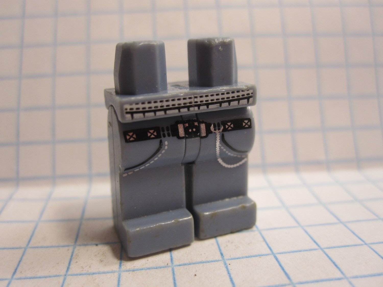 Lego part #970c00pb0075: Sand Blue Hips & legs w/ Black Belt, Pockets ...