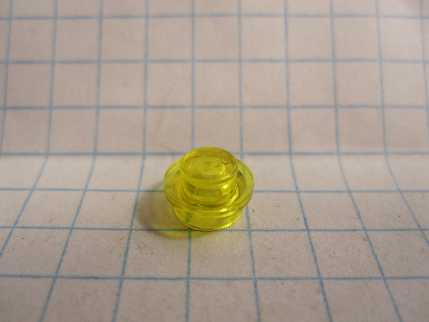 Lego part #4073: Trans-Yellow - 1x1 Round Plate