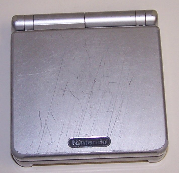Nintendo Game Boy Advance SP Silver GBA SP with Pirate of the caribbean ...