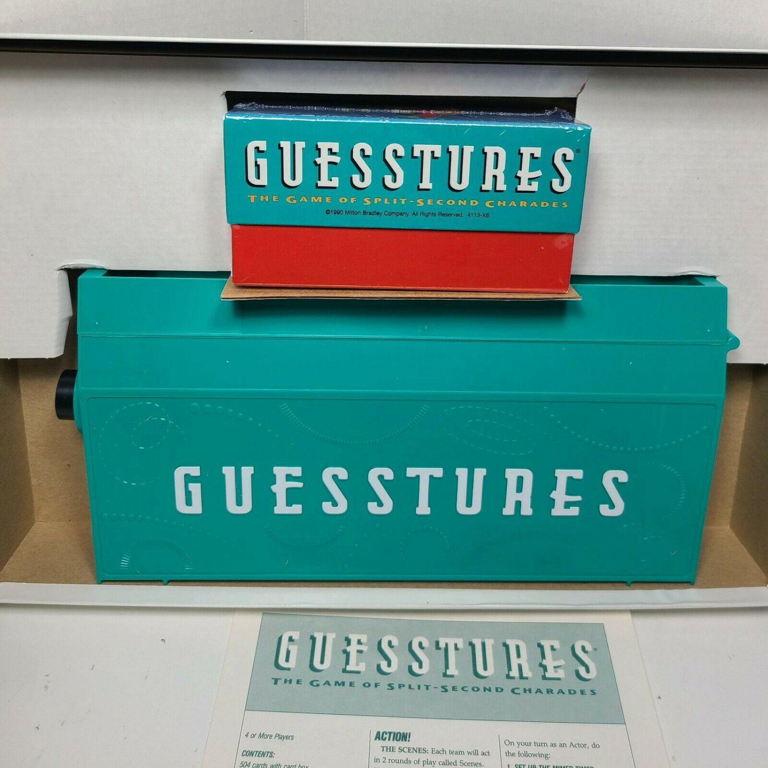 Guesstures Game The game of split-second Charades 1999