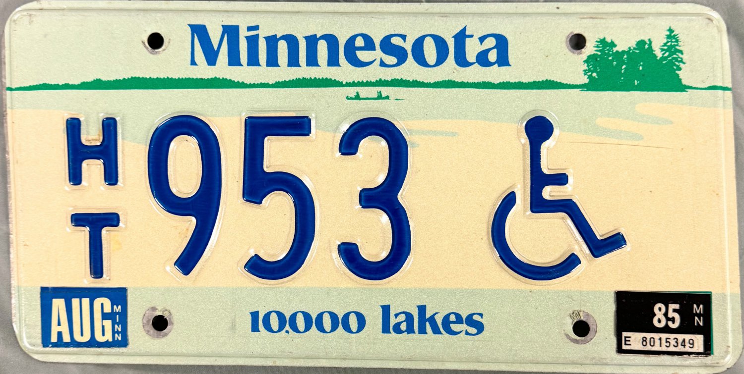 1985 Minnesota Disabled Wheelchair License Plate (HT 953)