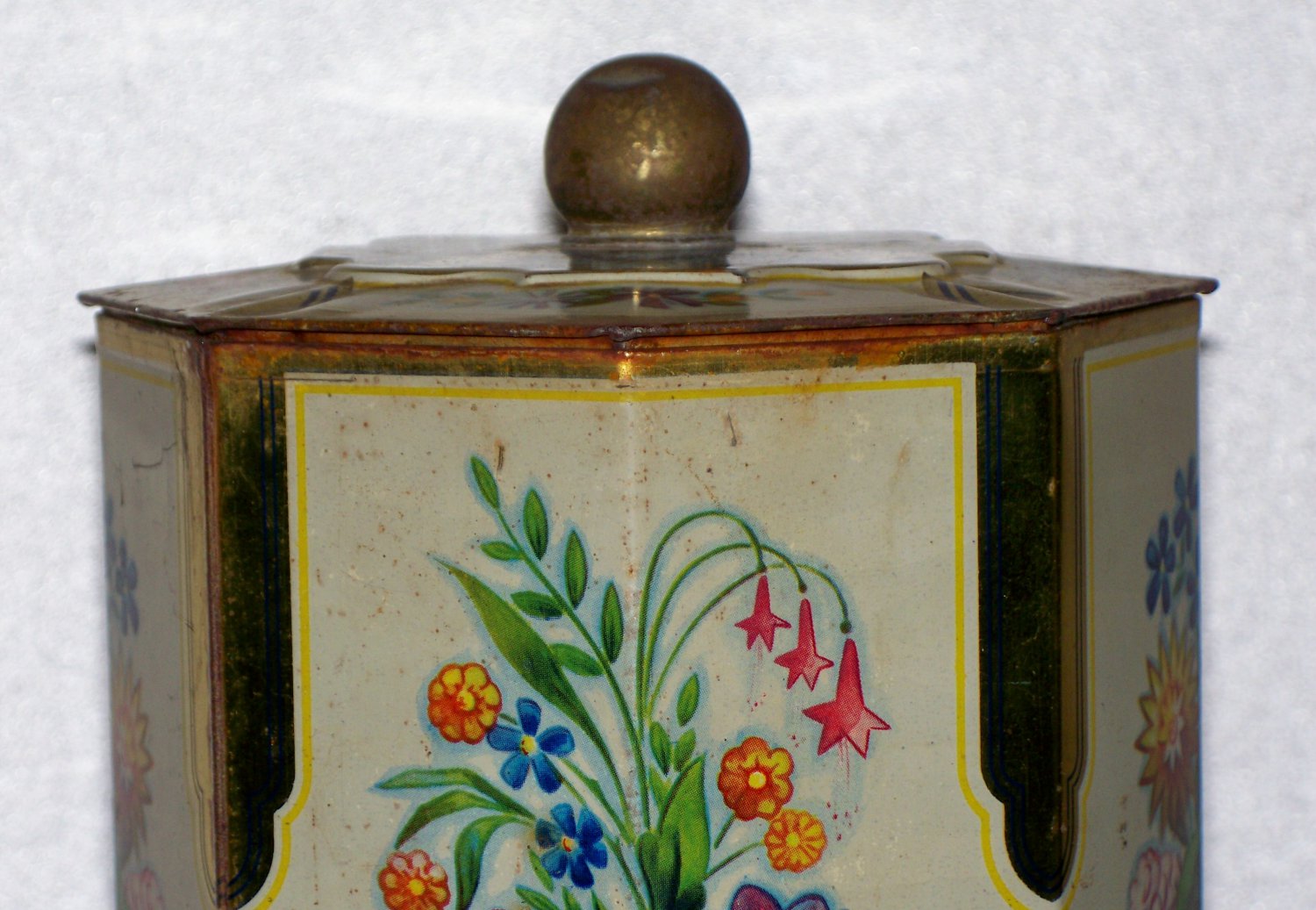 8 sided tin made in Western Germany with lid used and empty unknown maker