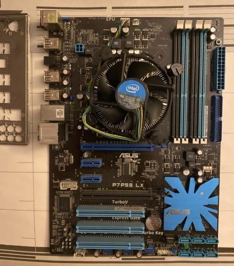 Asus P7P55 LX Motherboard and quad core cpu, fan, accessories