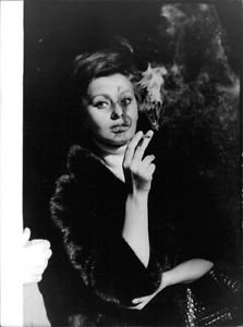 Sophia Loren smoking. - 8x10 photo