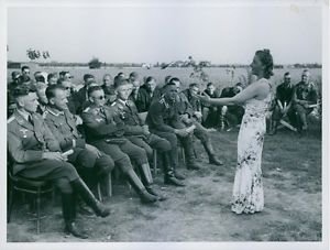 Woman performing for German officers and soldiers. - 8x10 photo