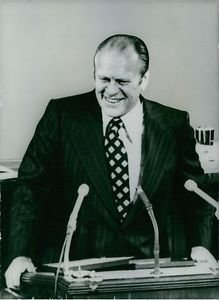 Gerald Rudolph Ford Jr. standing, smiling. - 8x10 photo