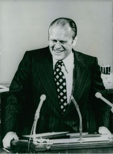 Gerald Rudolph Ford Jr. standing, smiling. - 8x10 photo