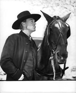 Gary Cooper with horse. - 8x10 photo