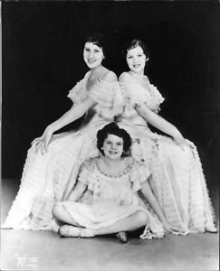 Judy Garland, sitting, with her sisters, known as the Gumm sisters ...