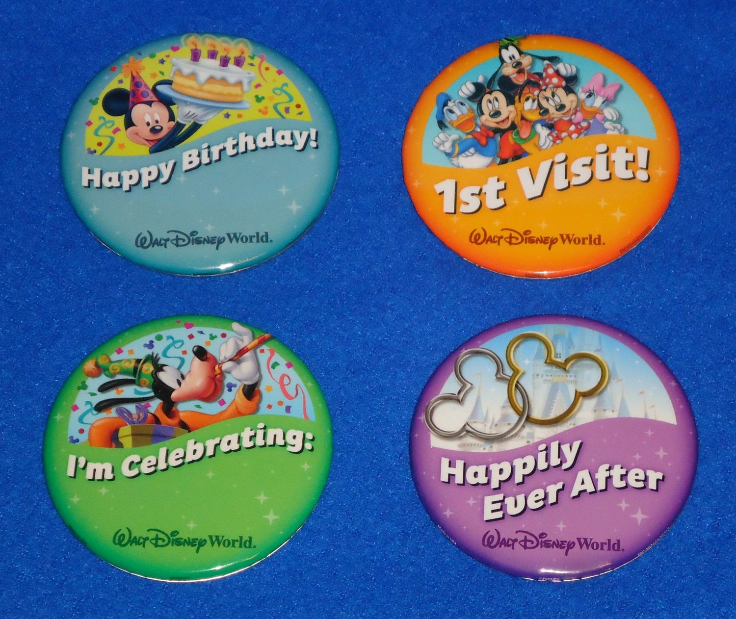 4 BRAND NEW SENSATIONAL WALT DISNEY WORLD CELEBRATION BUTTON PINS ...
