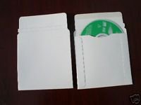 100 CARDBOARD CD/DVD MAILER W/SEAL, SEAM & FLAP-JS93