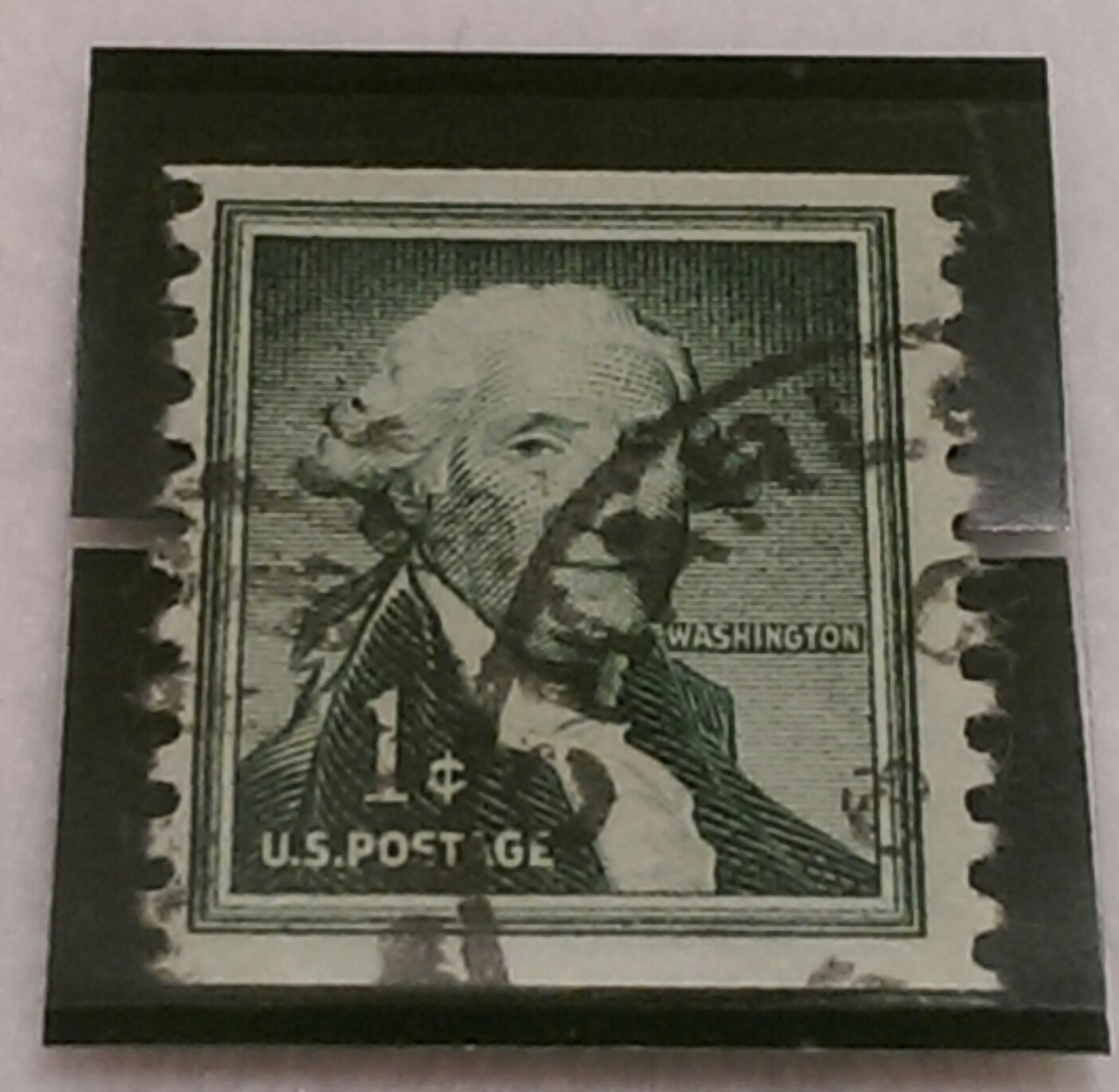 One Cent Green Washington Postage Stamp ($1,800)