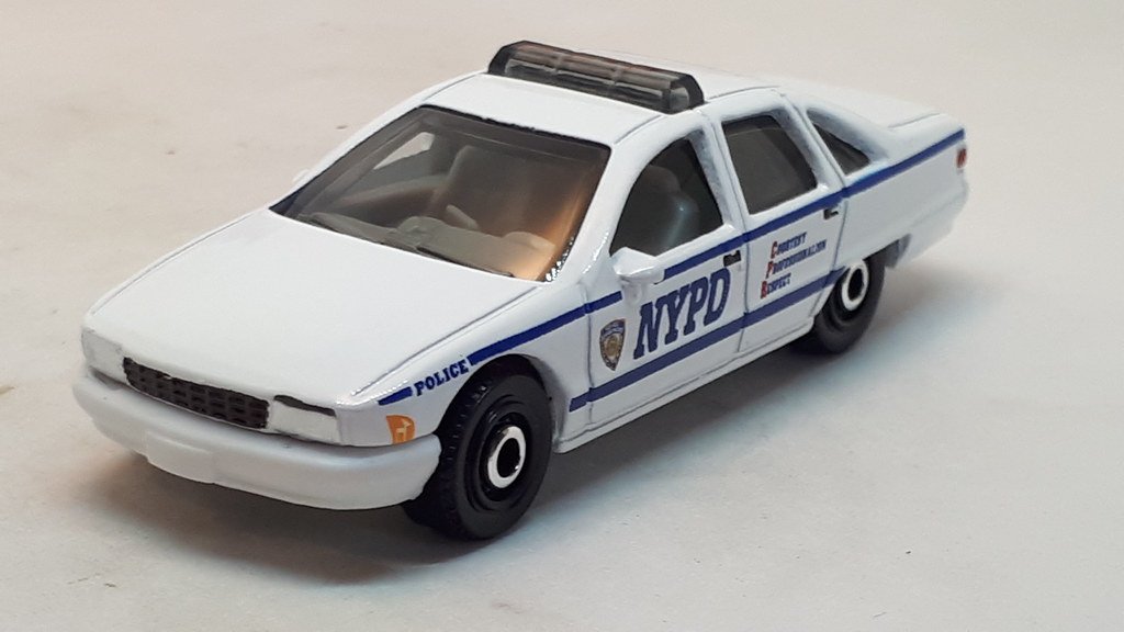 2021 Matchbox #32 1994 Chevy Caprice Classic in White Mint on Card GVX42